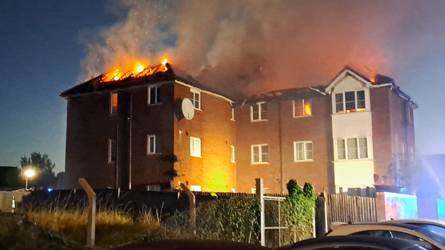 Man charged with attempted murder and arson following Enfield flats ...